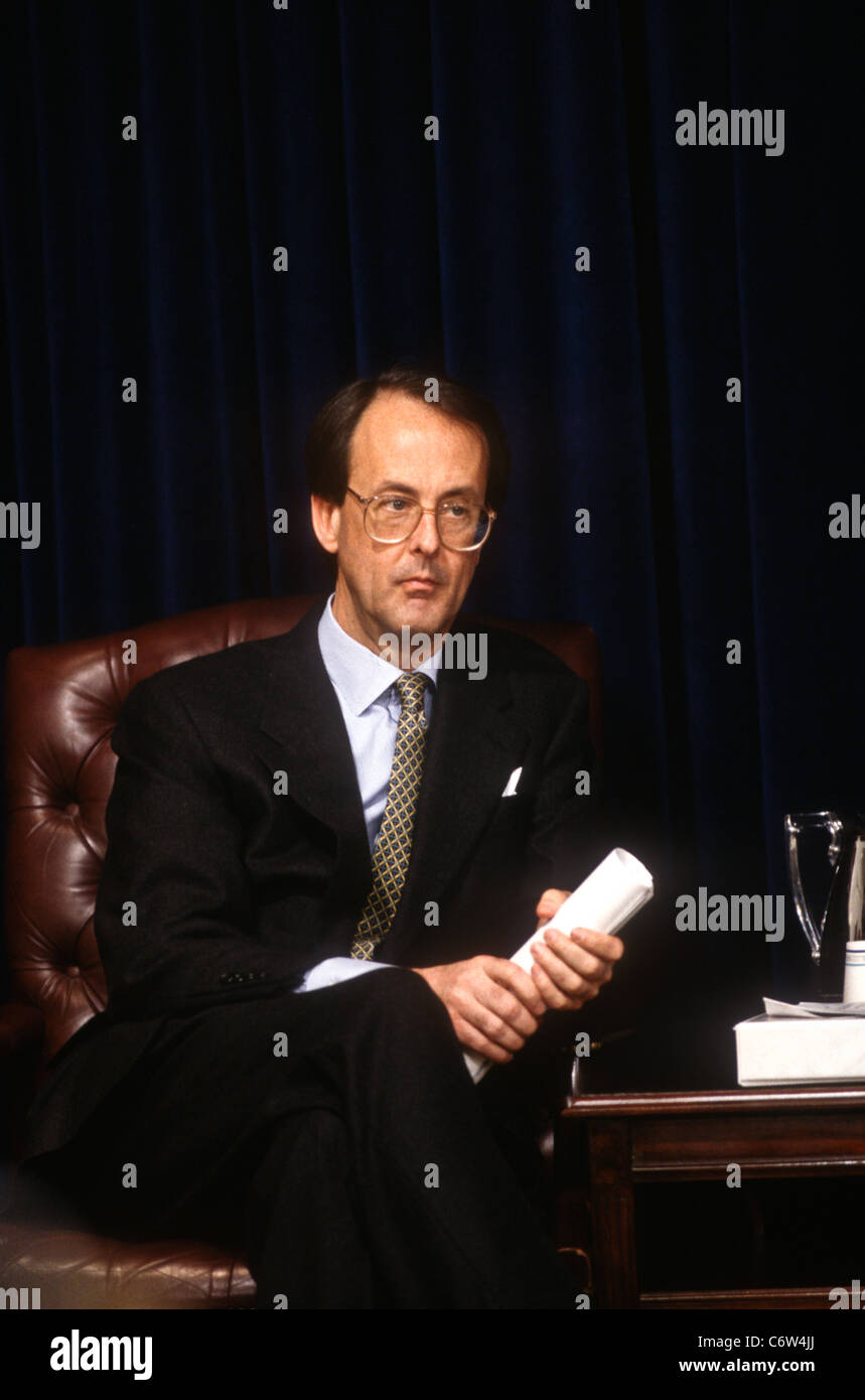 Chief of Staff Erskine Bowles listens as US President Bill Clinton ...