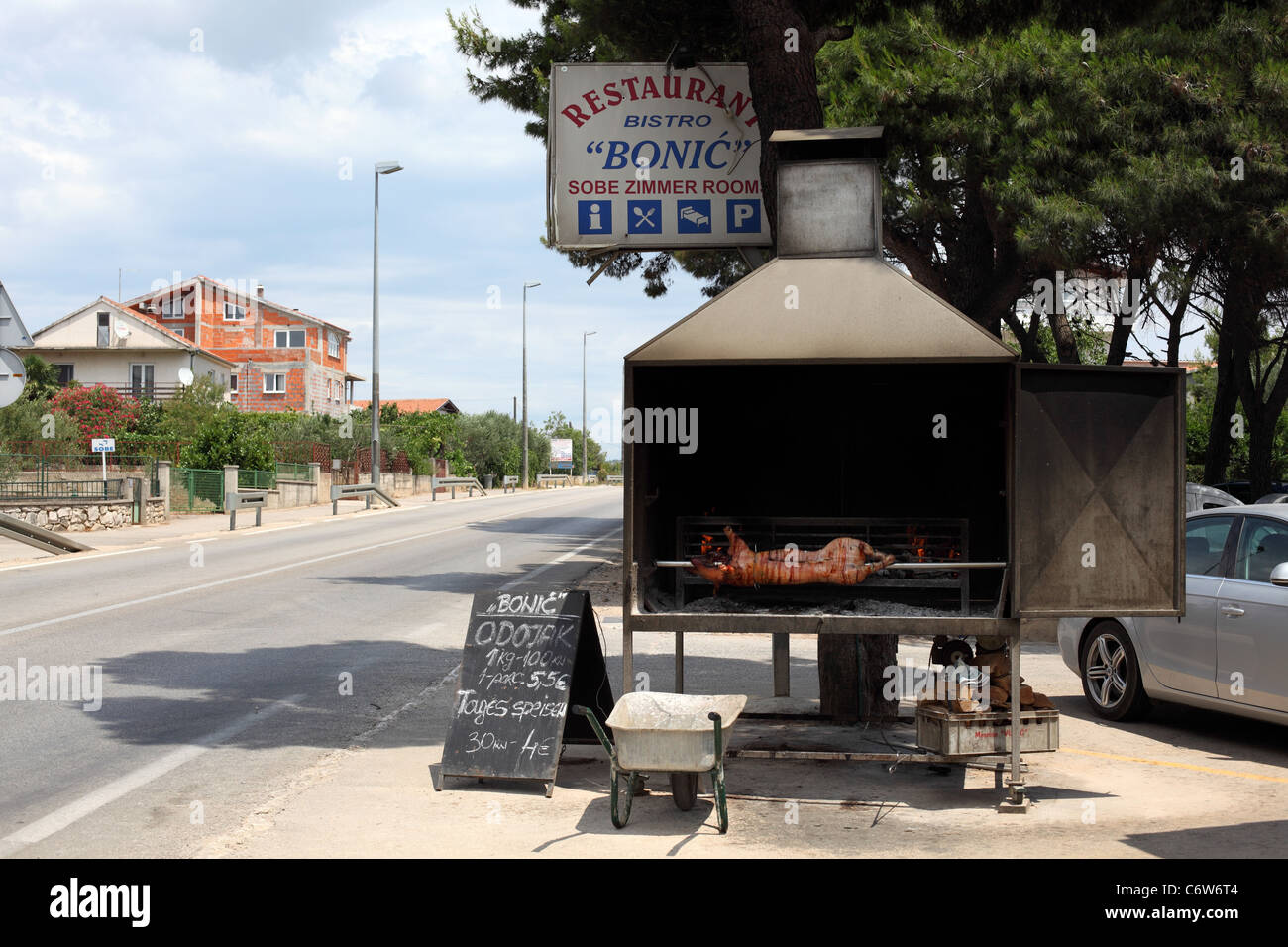 Traditional Croatian Restaurant with a piglet on a spitroast Stock ...