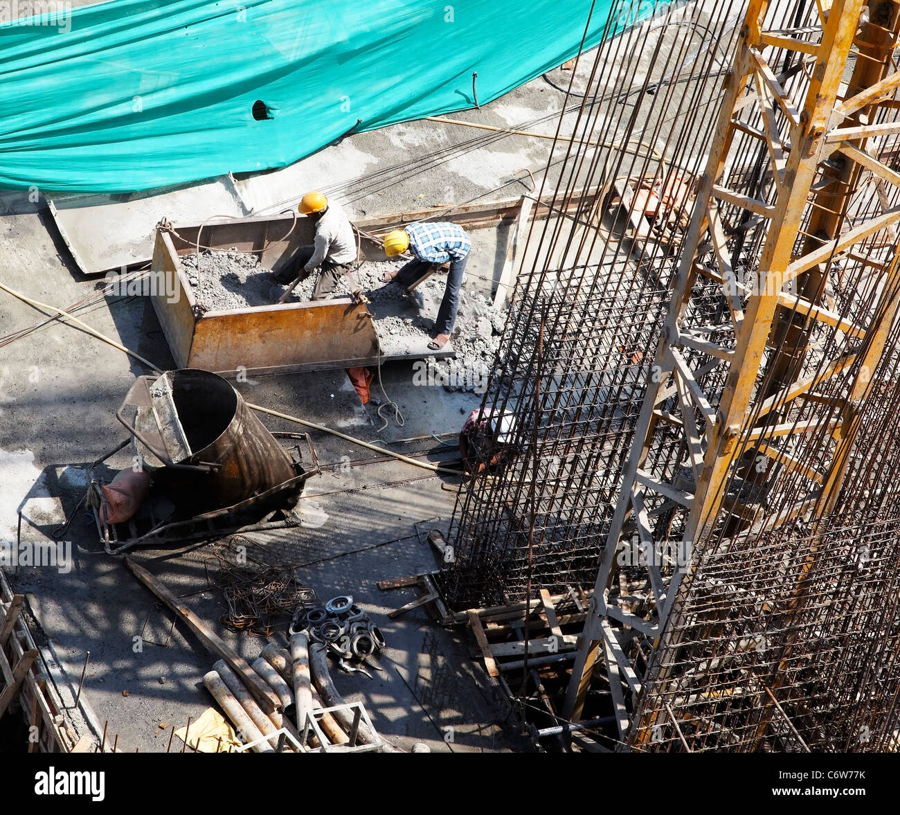 Mumbai, India - March, 2011 - Indian high rise building site workers ...