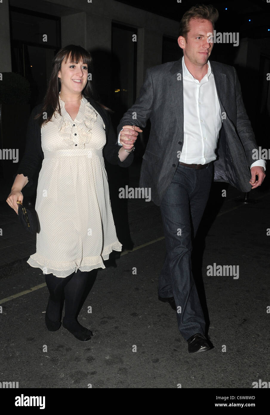 Pregnant Natalie Cassidy outside the May Fair hotel with her boyfriend ...