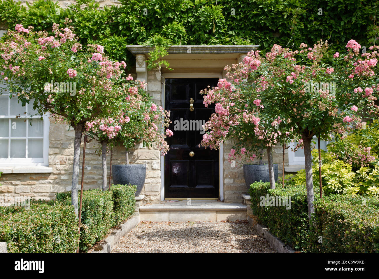 Detail of village house front door & path Stock Photo - Alamy