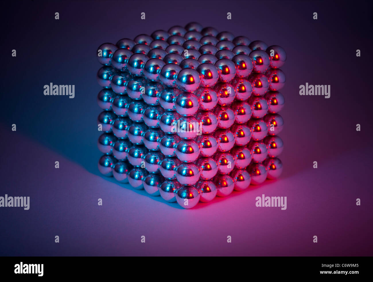 A shot in the studio of a piled up steel ball cube. Billes d'acier ...