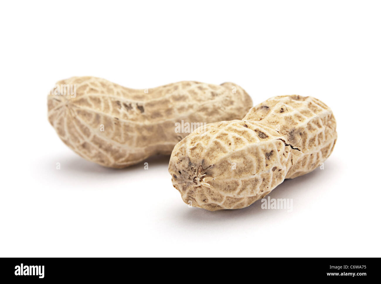 Peanut in shell closeup isolated on white background Stock Photo - Alamy