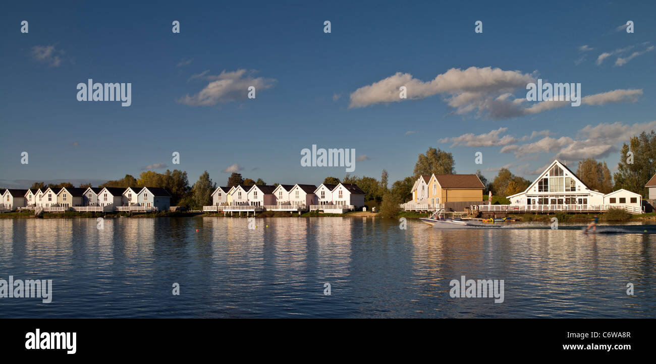 New England style holiday lodges and the Watermark centre on the shore ...