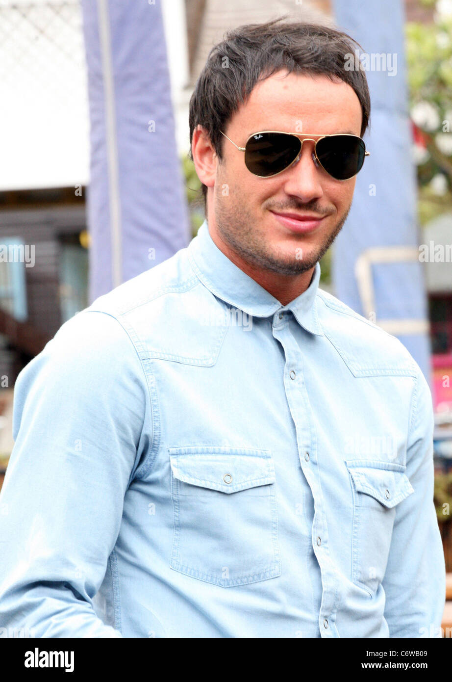Jack Tweed takes a break from recording a feature outside the ITV ...