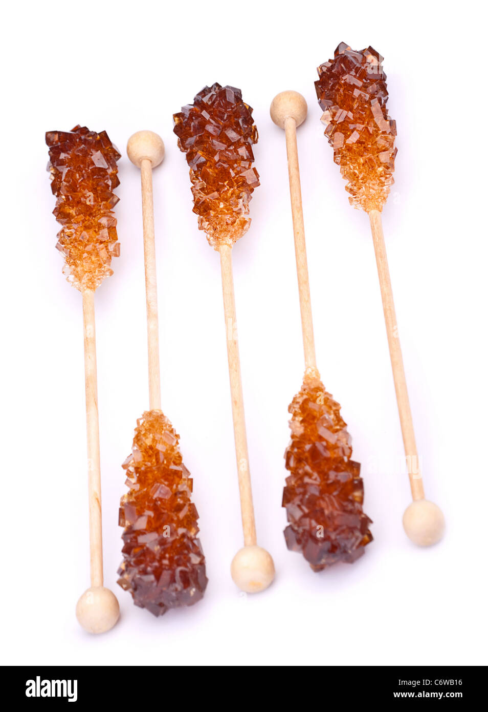 Brown amber sugar crystal on wood stick Stock Photo - Alamy