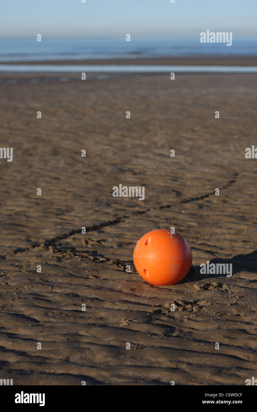 Buoy on Sand Stock Photo - Alamy