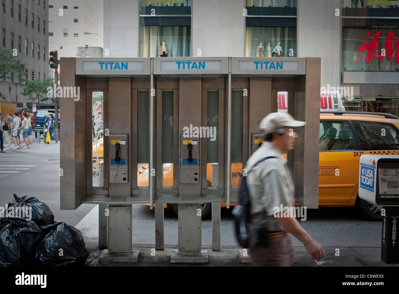 A man walks by Titan Payphone in the New York City borough of Manhattan ...