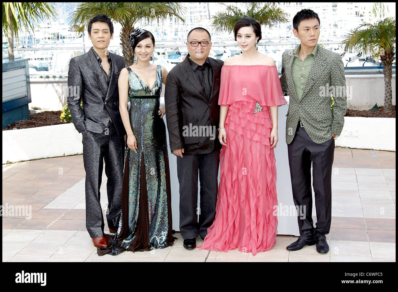 Director Wang Xiaoshuai (C) poses with Chinese actress Fan Bingbing ...