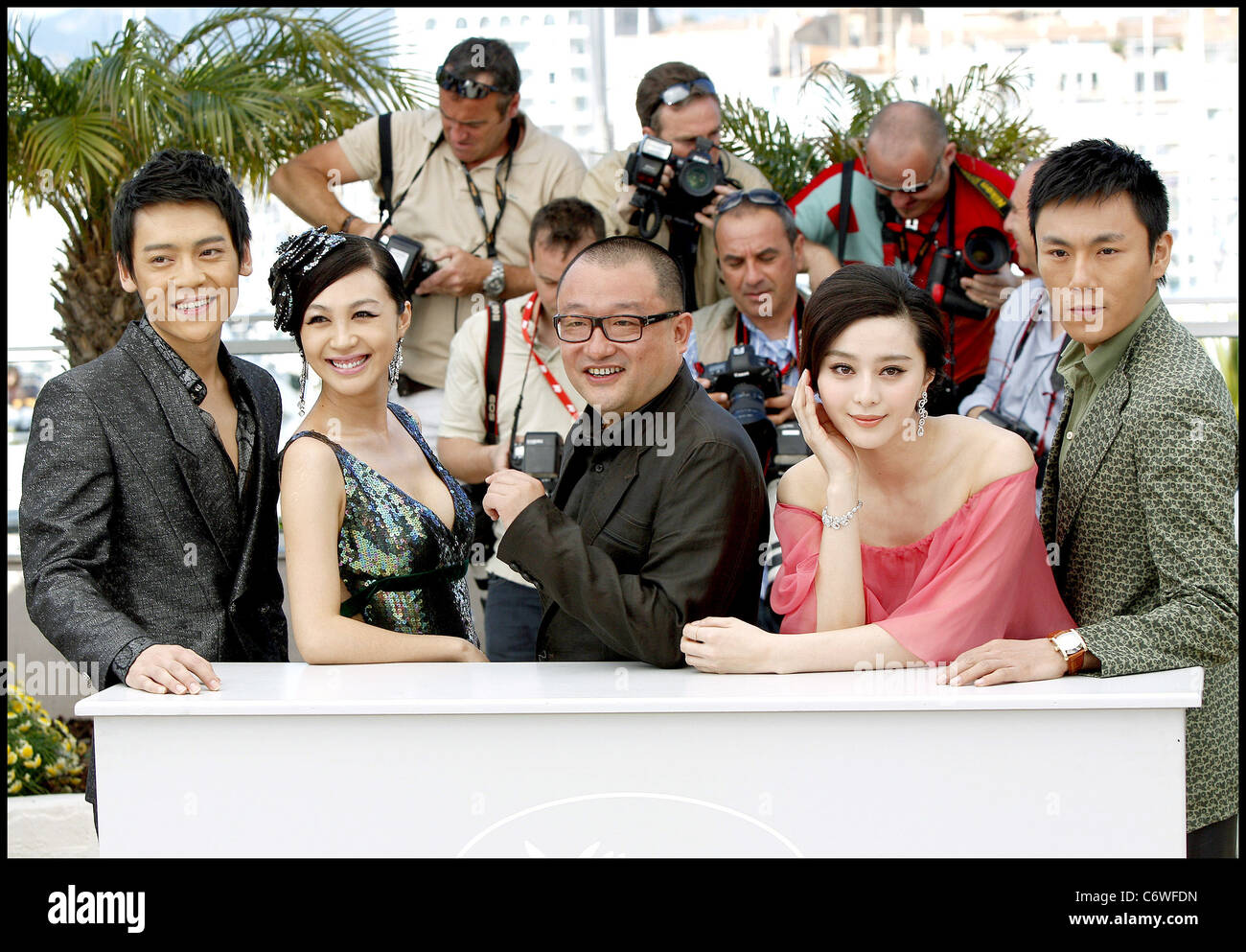 Director Wang Xiaoshuai (C) poses with Chinese actress Fan Bingbing ...