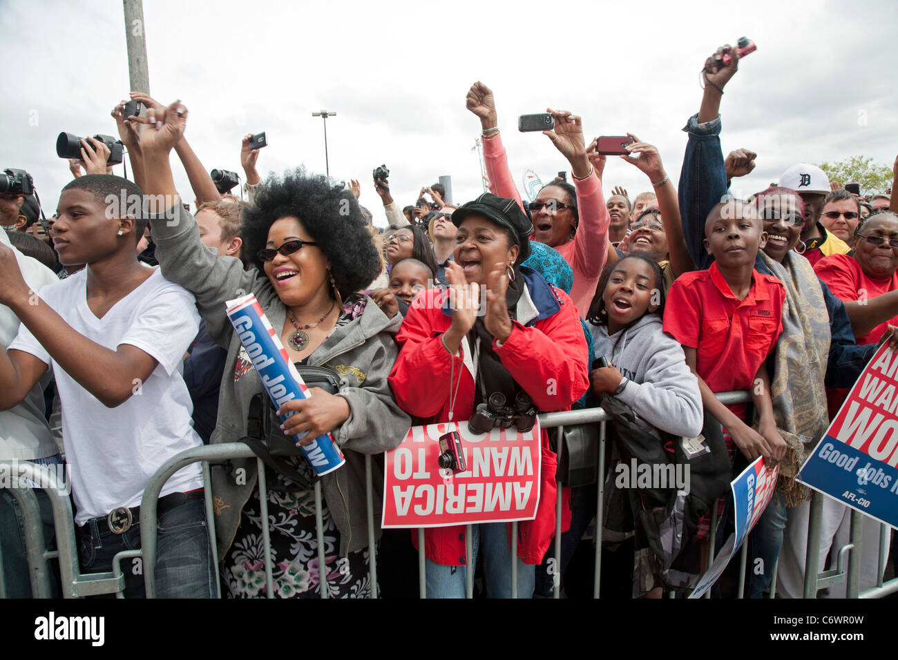 Detroit, Michigan - The crowd cheers as President Barack Obama arrives ...