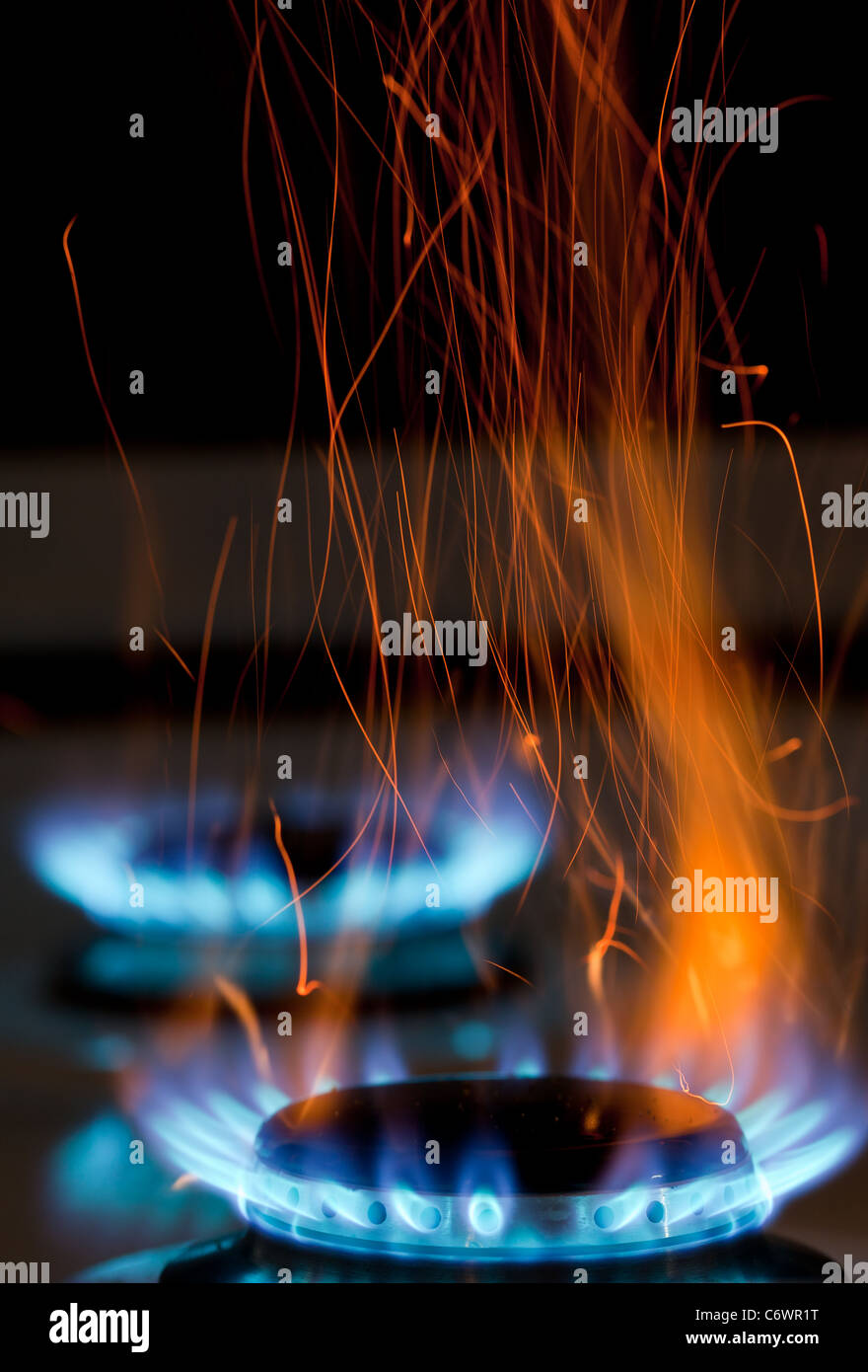 flame sand sparks over gas stove Stock Photo - Alamy