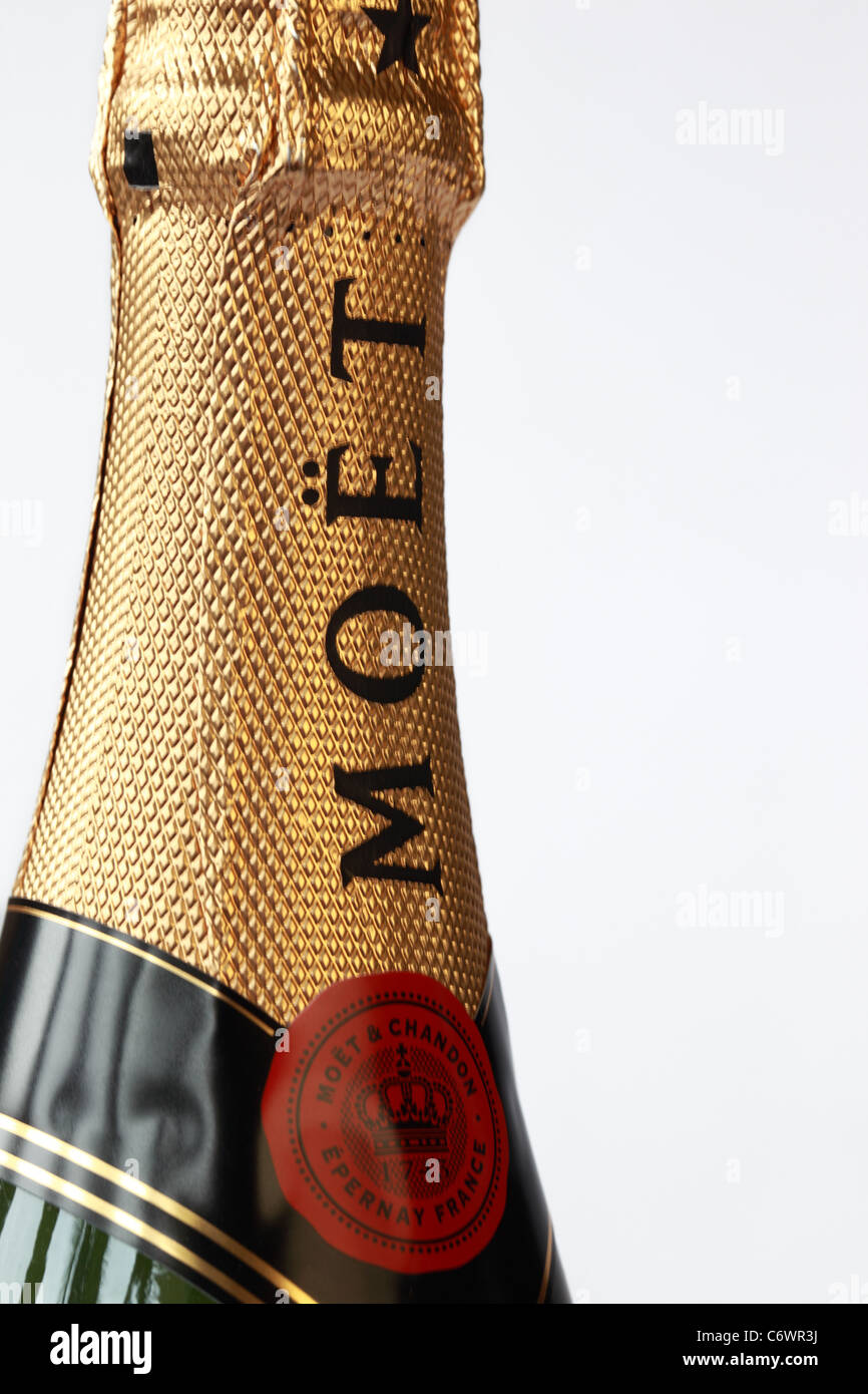 Close up of the top gold foil of an unopened bottle of Moet & Chandon ...