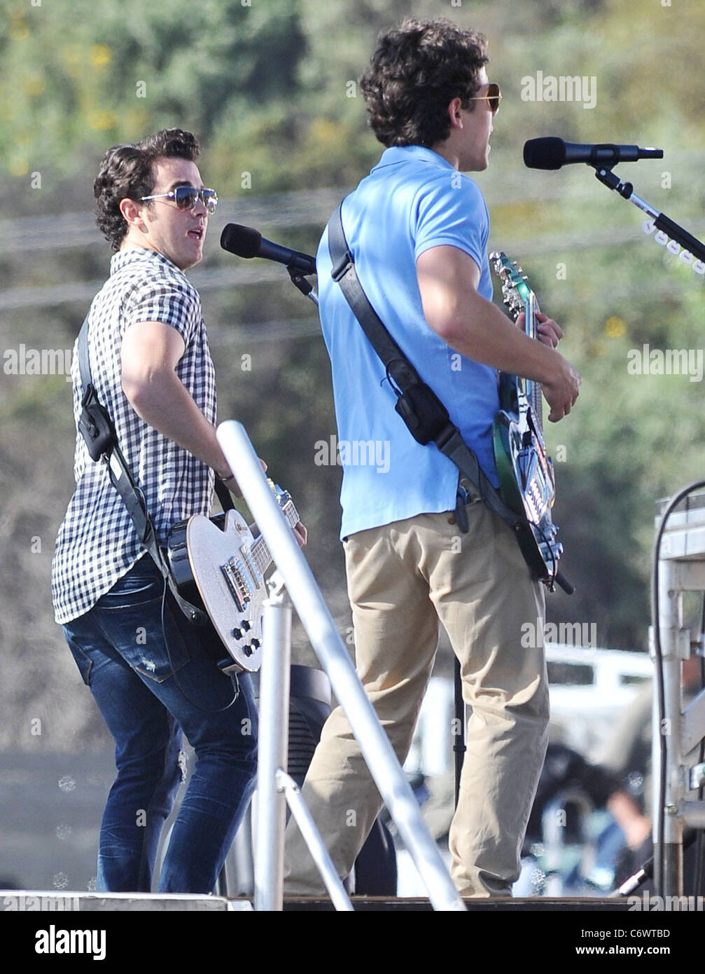 Kevin Jonas and Nick Jonas The Jonas Brothers on the set of their new ...
