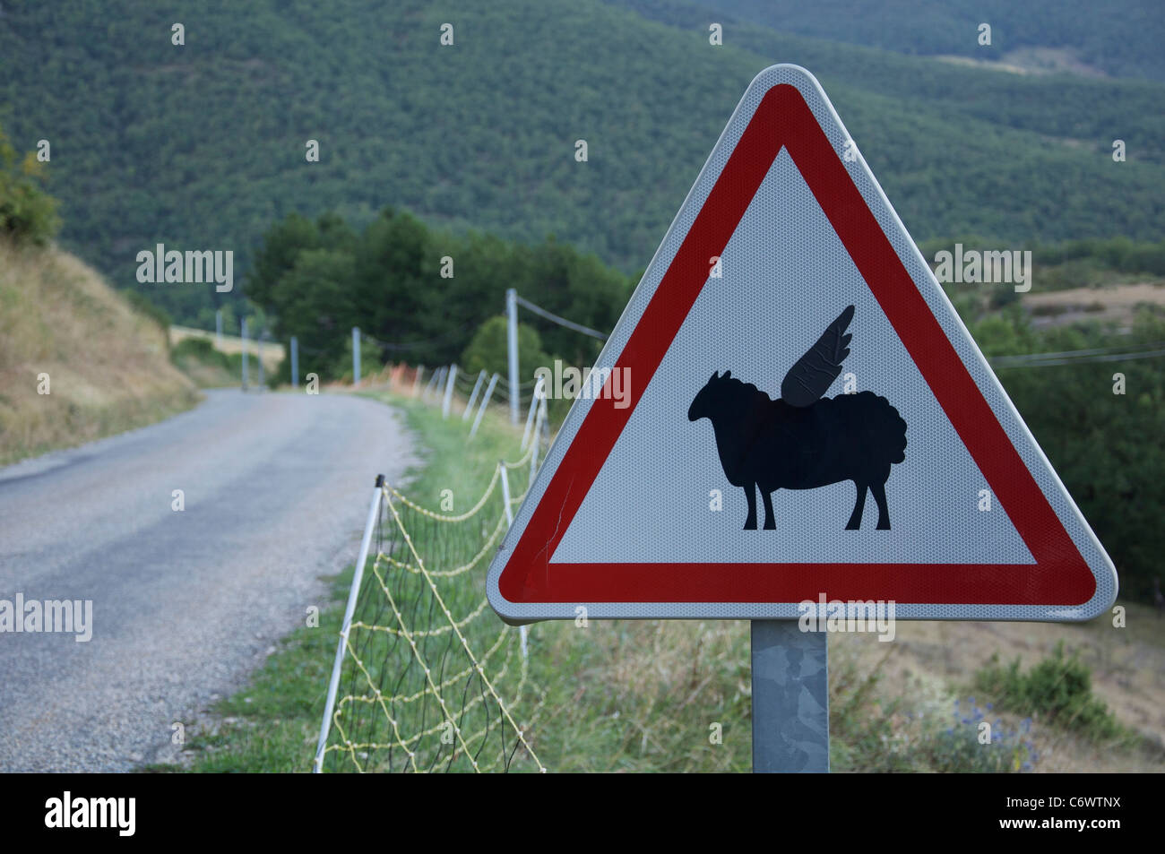 Warning, low flying sheep! This rural French road sign has been ...