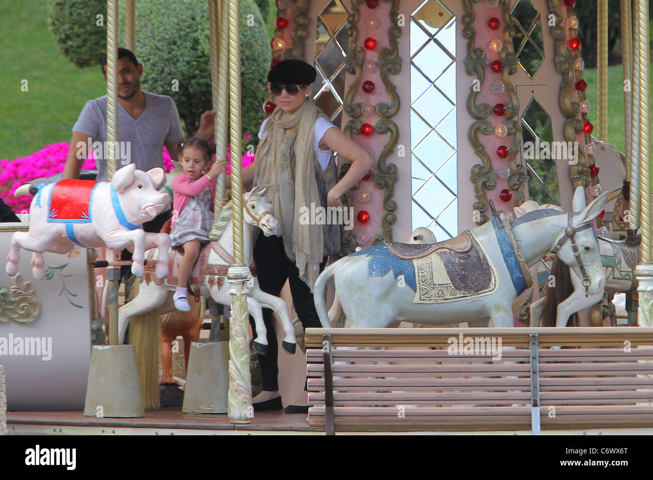 Jennifer Lopez with her twins Emma and Max enjoy a ride on the carousel ...