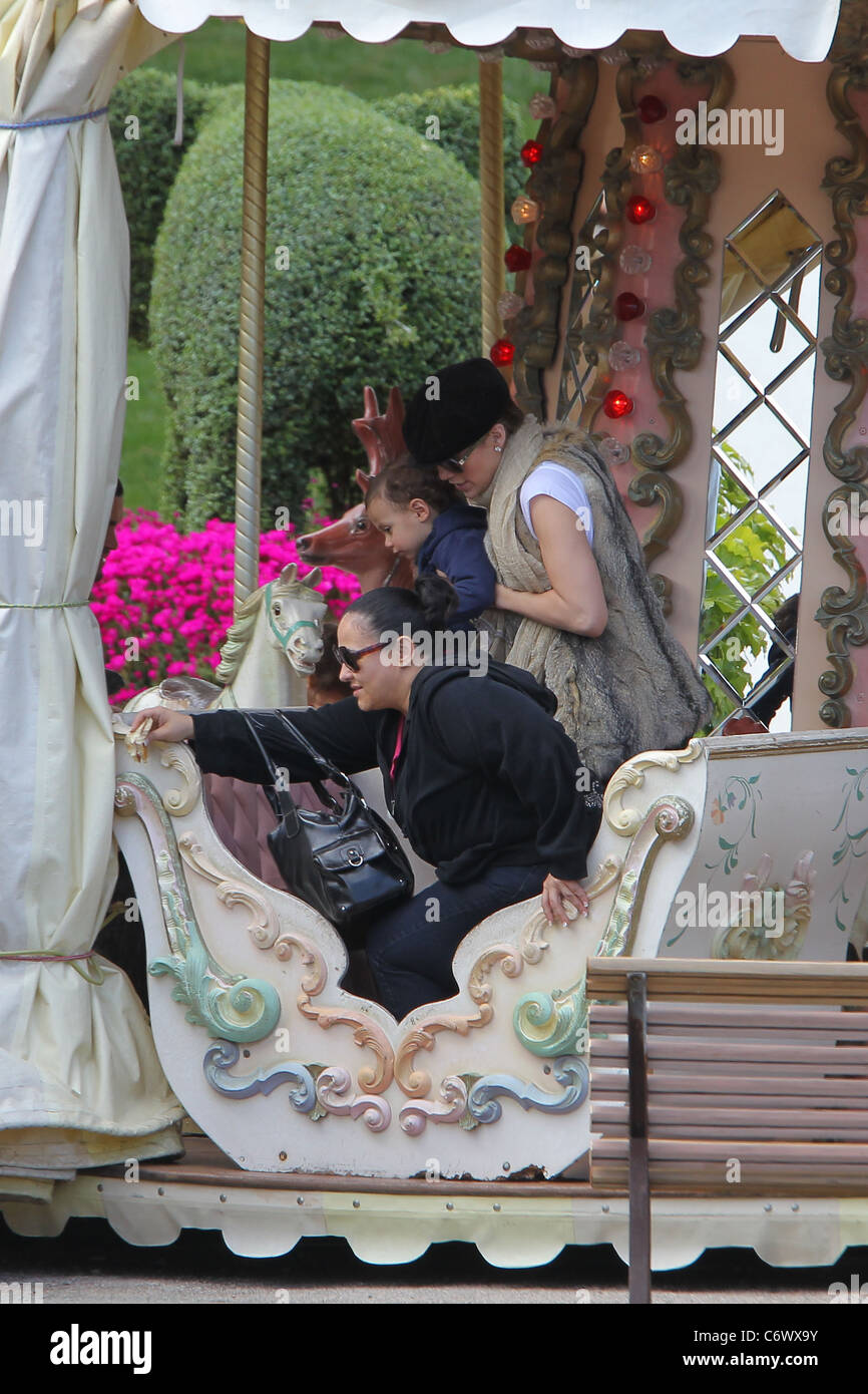 Jennifer Lopez with her twins Emma and Max enjoy a ride on the carousel ...