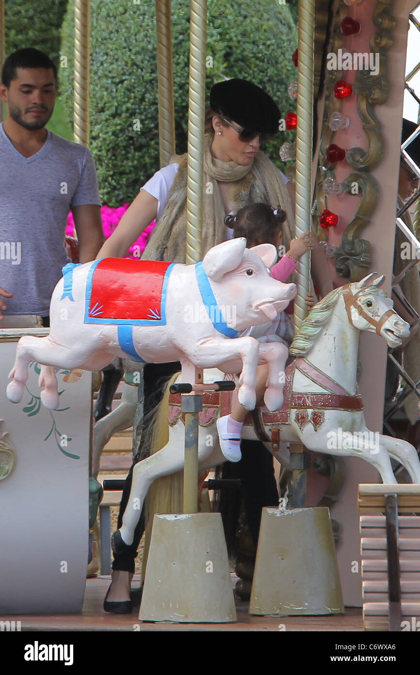 Jennifer Lopez with her twins Emma and Max enjoy a ride on the carousel ...