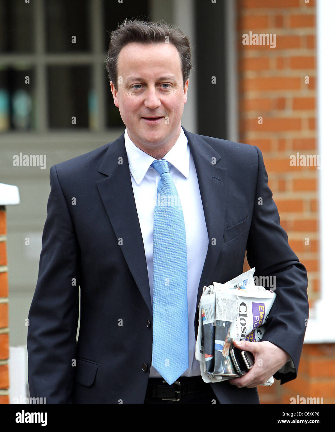 David Cameron leaves his home to head to meetings about the current U.K ...