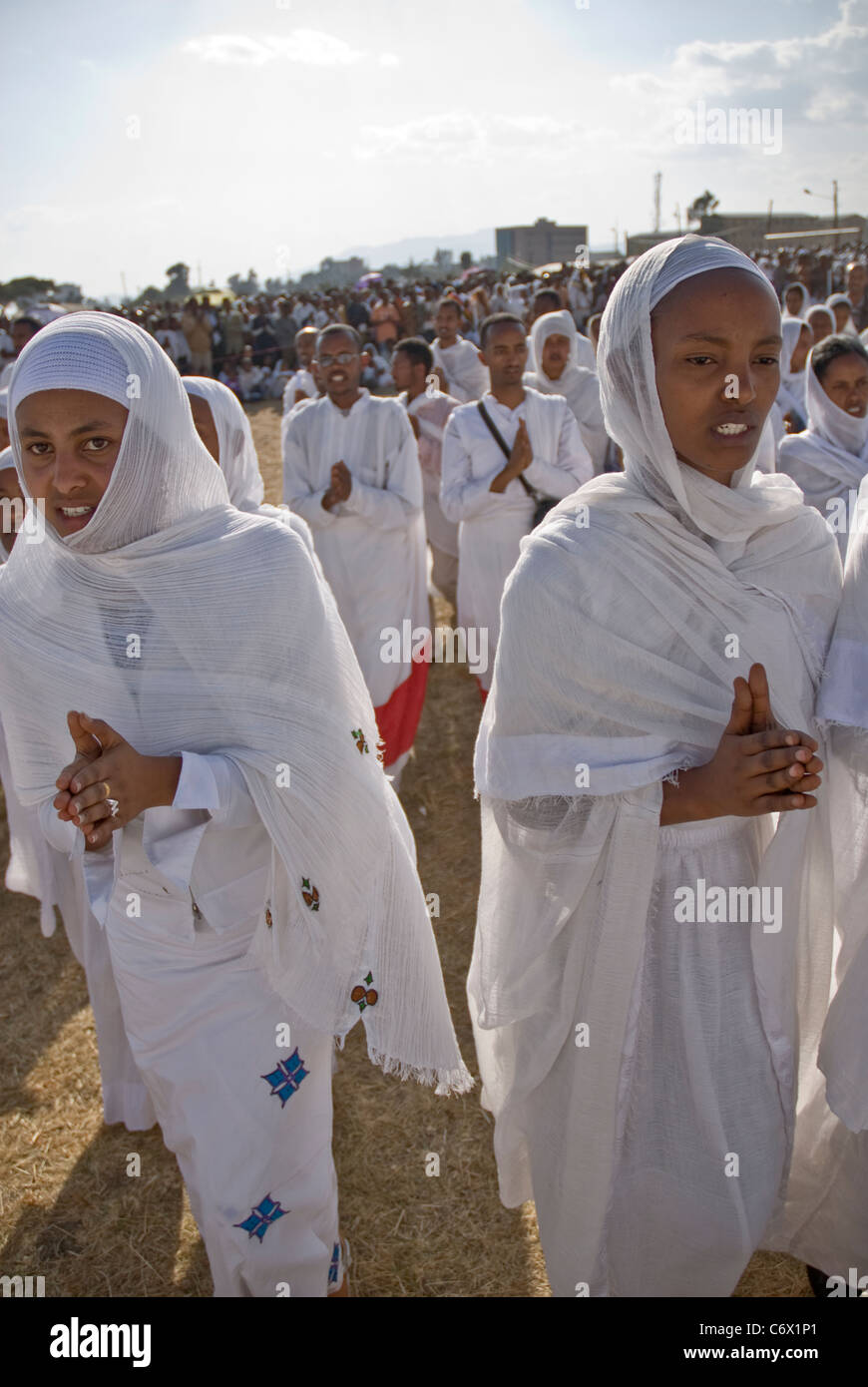 Christian Orthodox devotees singing and clapping as they arrive at the ...