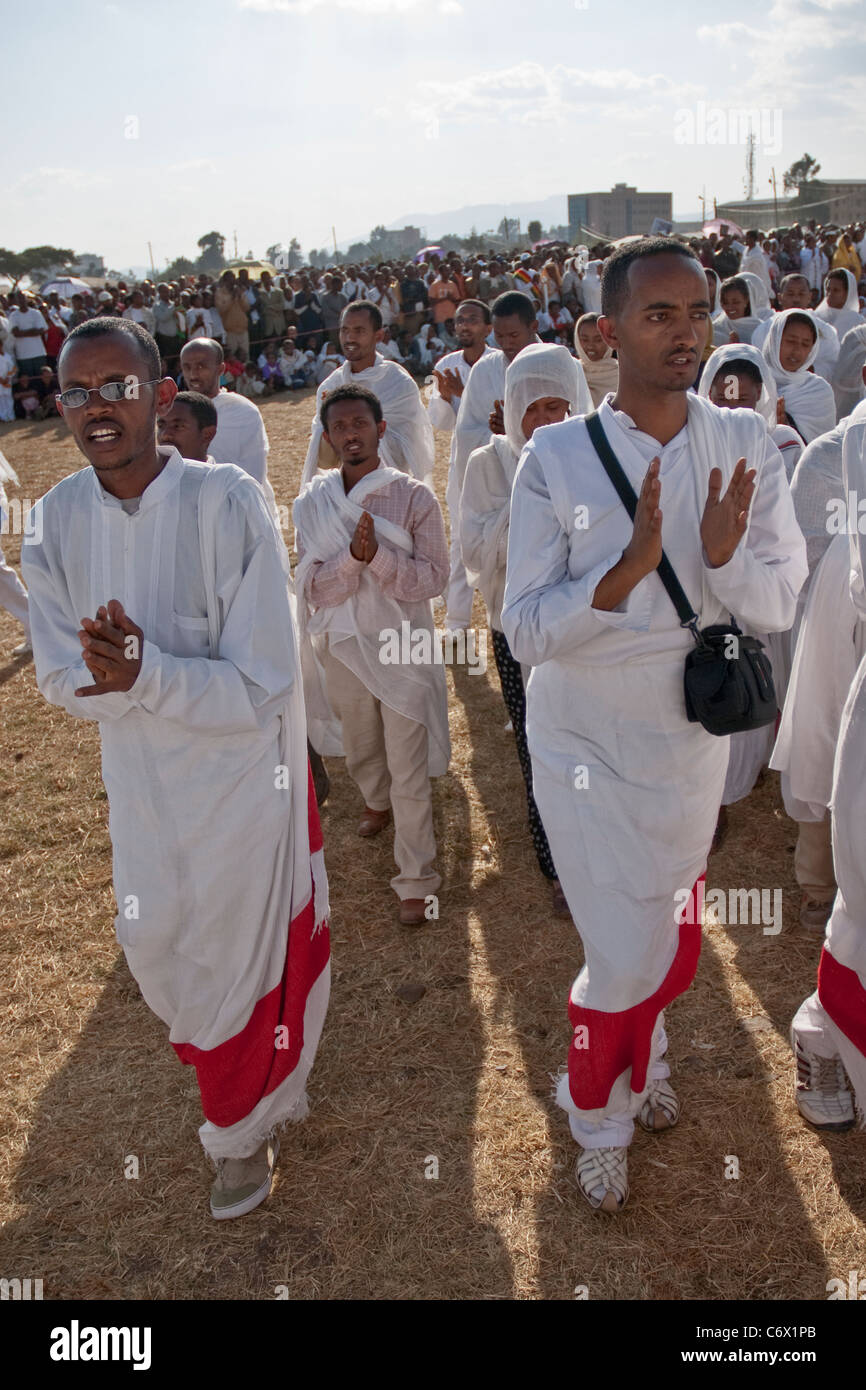 Christian Orthodox devotees singing and clapping as they arrive at the ...