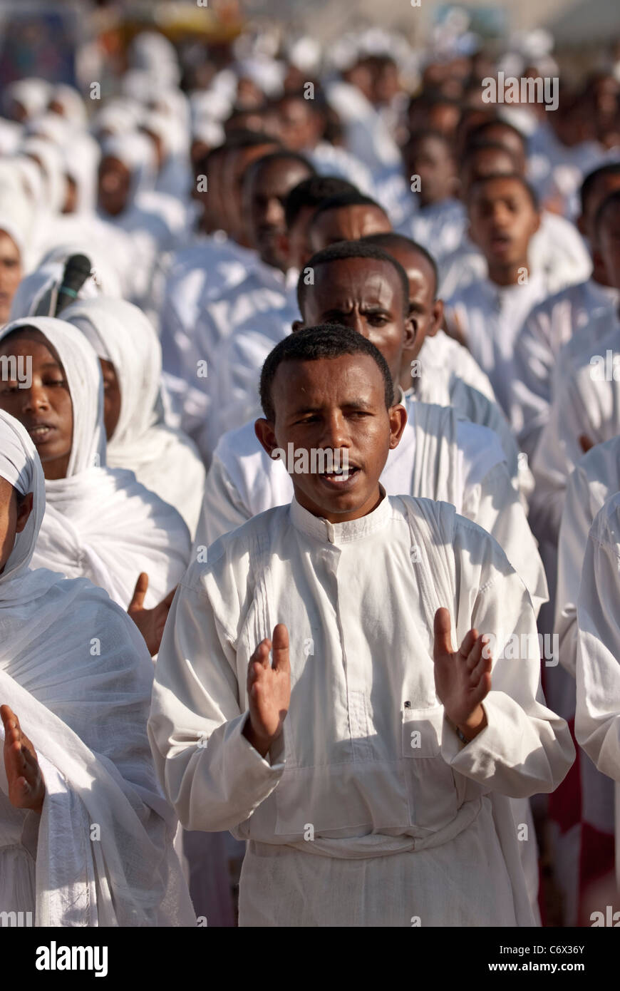 Christian Orthodox devotees singing, clapping and praying at the Timket ...
