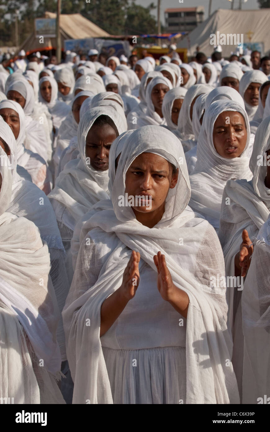 Christian Orthodox devotees singing, clapping and praying at the Timket ...