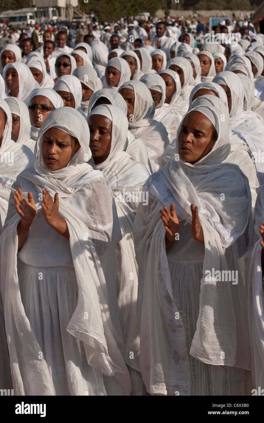 Christian Orthodox devotees singing, clapping and praying at the Timket ...
