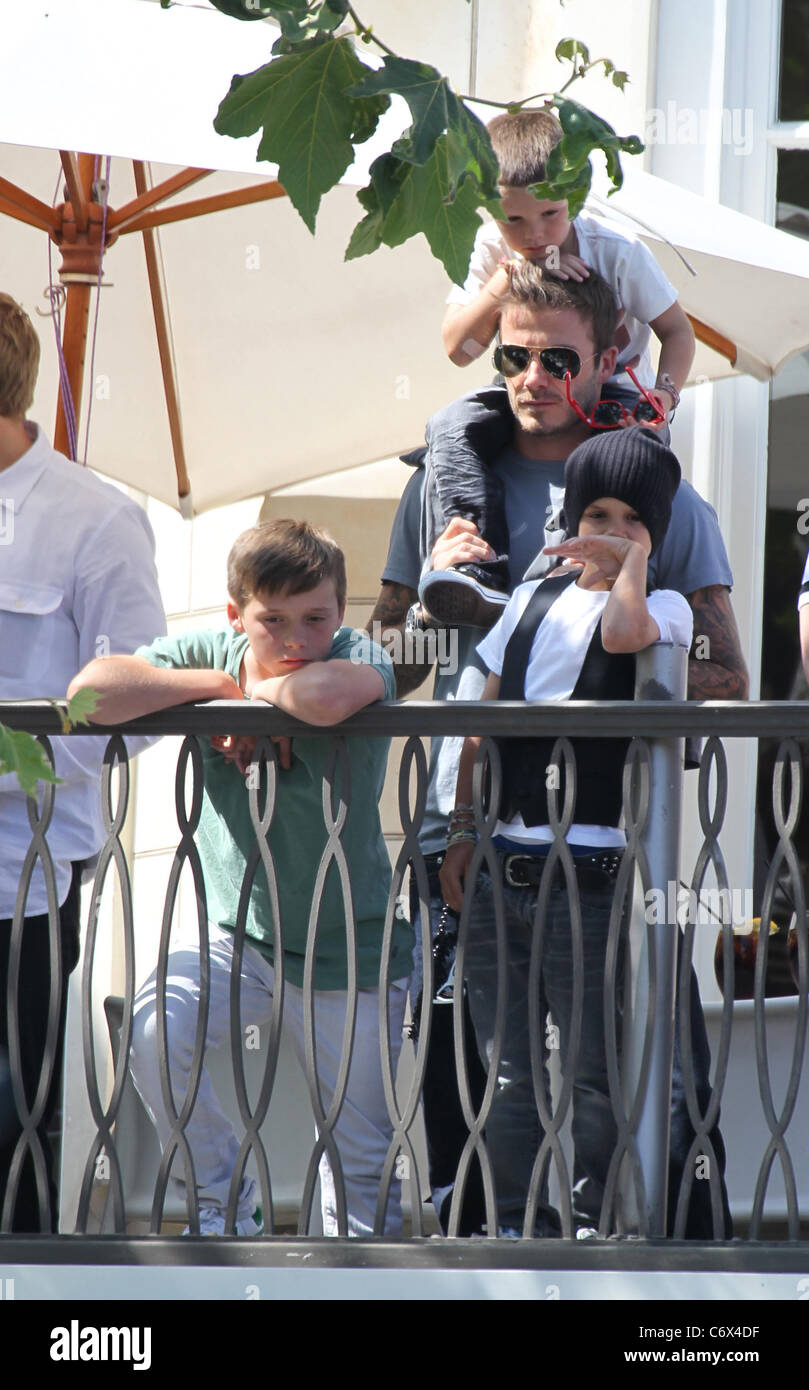 David Beckham with his sons Cruz, Romeo and Brooklyn watch the Jonas ...