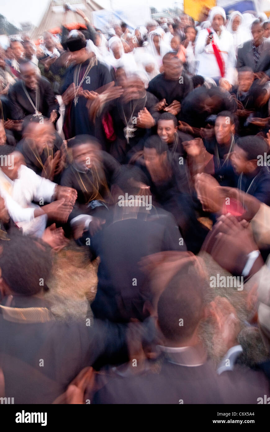 Christian Orthodox devotees singing and clapping at the Timket Festival ...