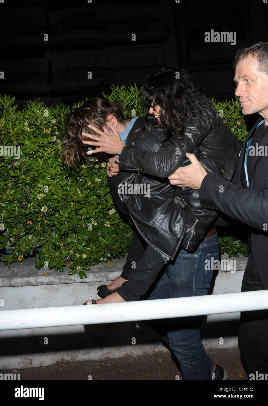 Michelle rodriguez being carried from hi-res stock photography and ...