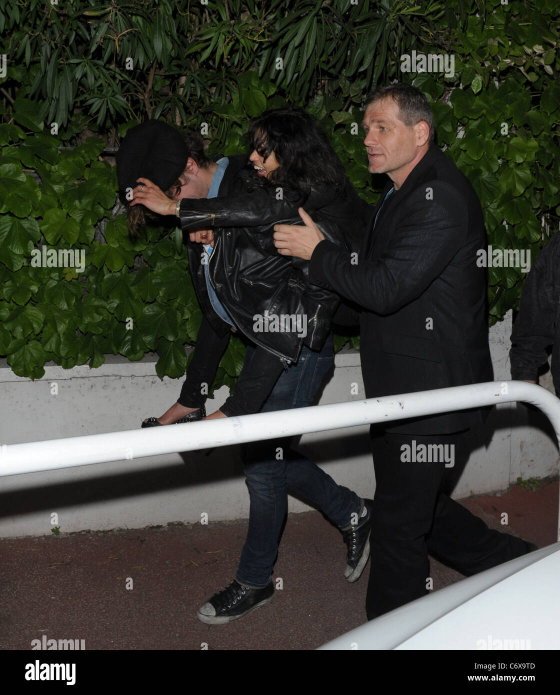Michelle rodriguez being carried from hi-res stock photography and ...