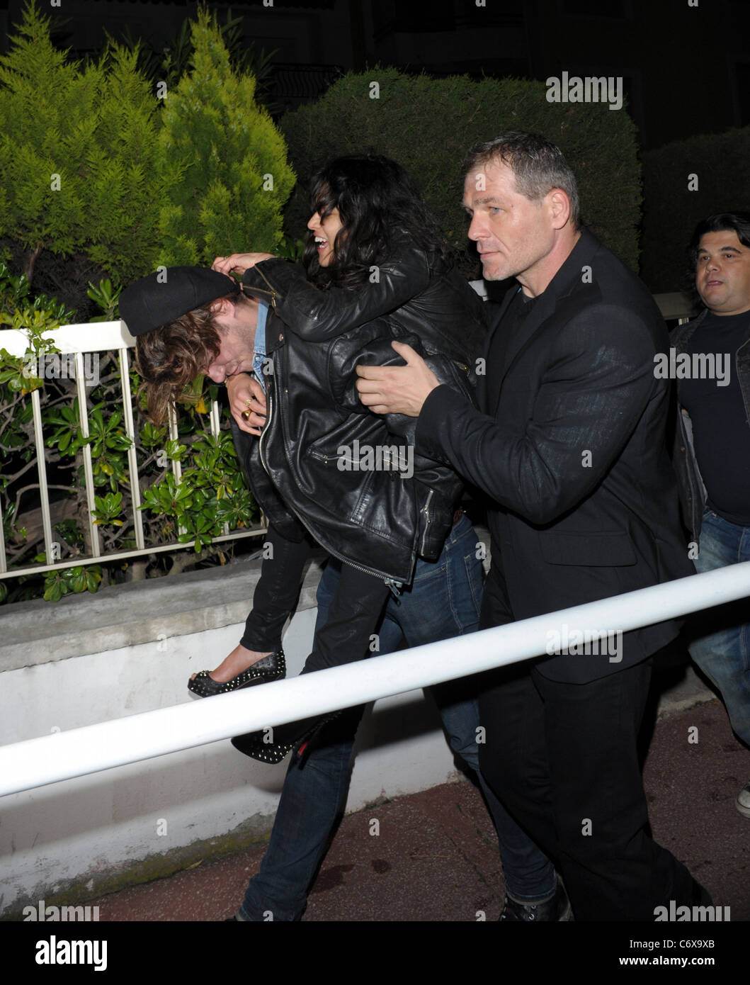 Michelle rodriguez being carried from hi-res stock photography and ...