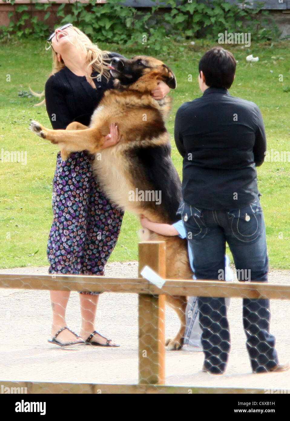 Kerry Katona playing with German Shepherd dog near her house Sussex ...
