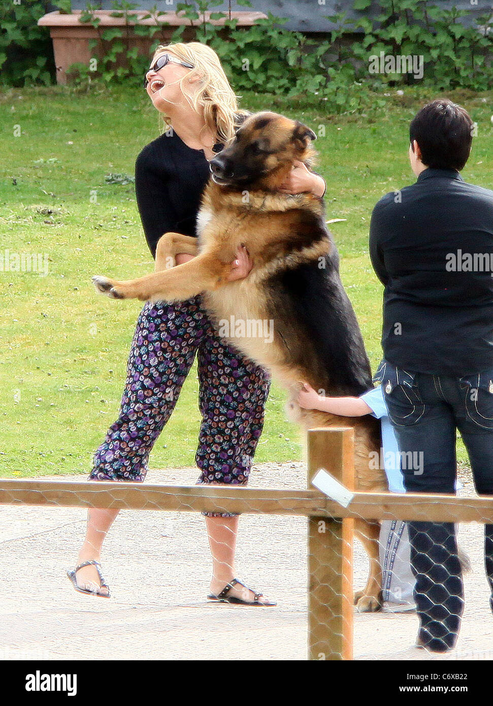 Kerry Katona playing with German Shepherd dog near her house Sussex ...