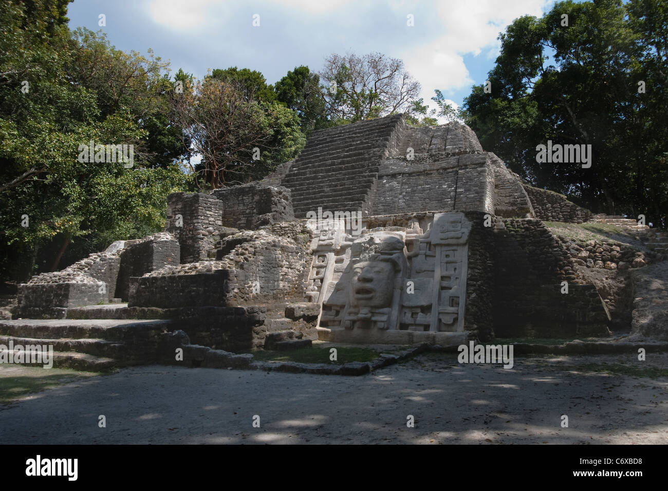 The Mask Temple with reconstructed mask at Lamanai, Belize Stock Photo ...