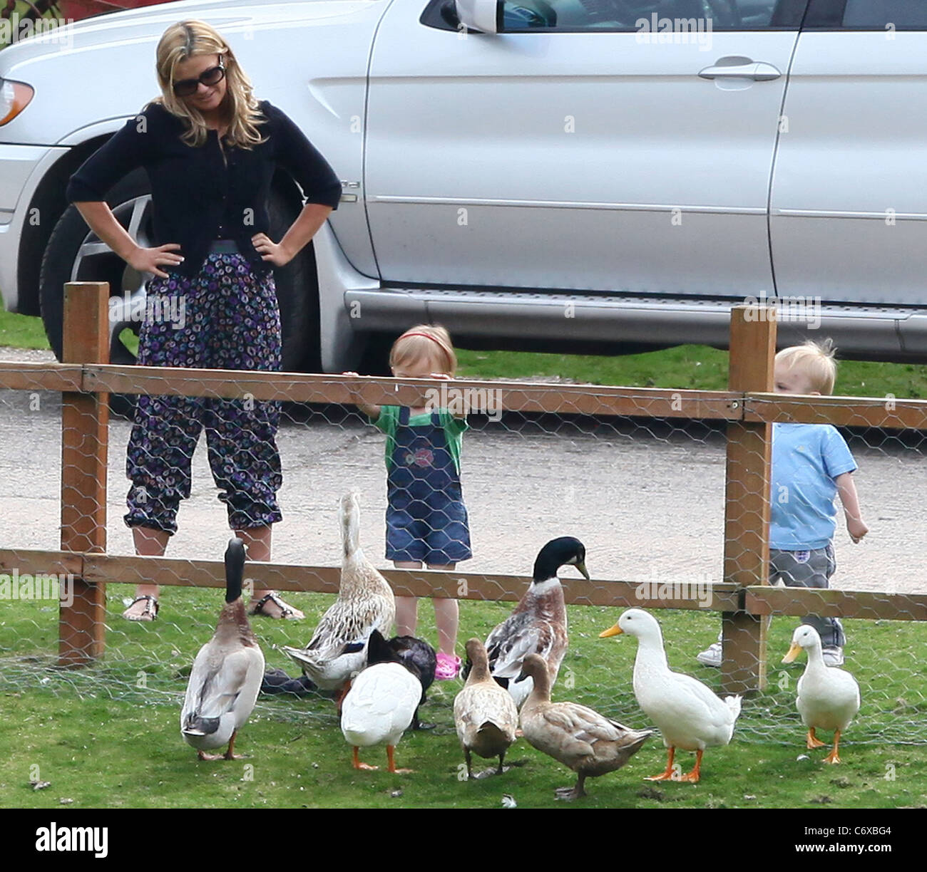 Kerry Katona feeding the ducks with her children Max and Heidi Sussex ...