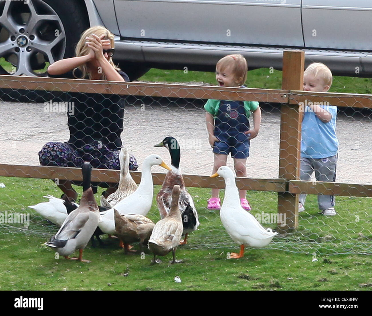 Kerry Katona feeding the ducks with her children Max and Heidi Sussex ...