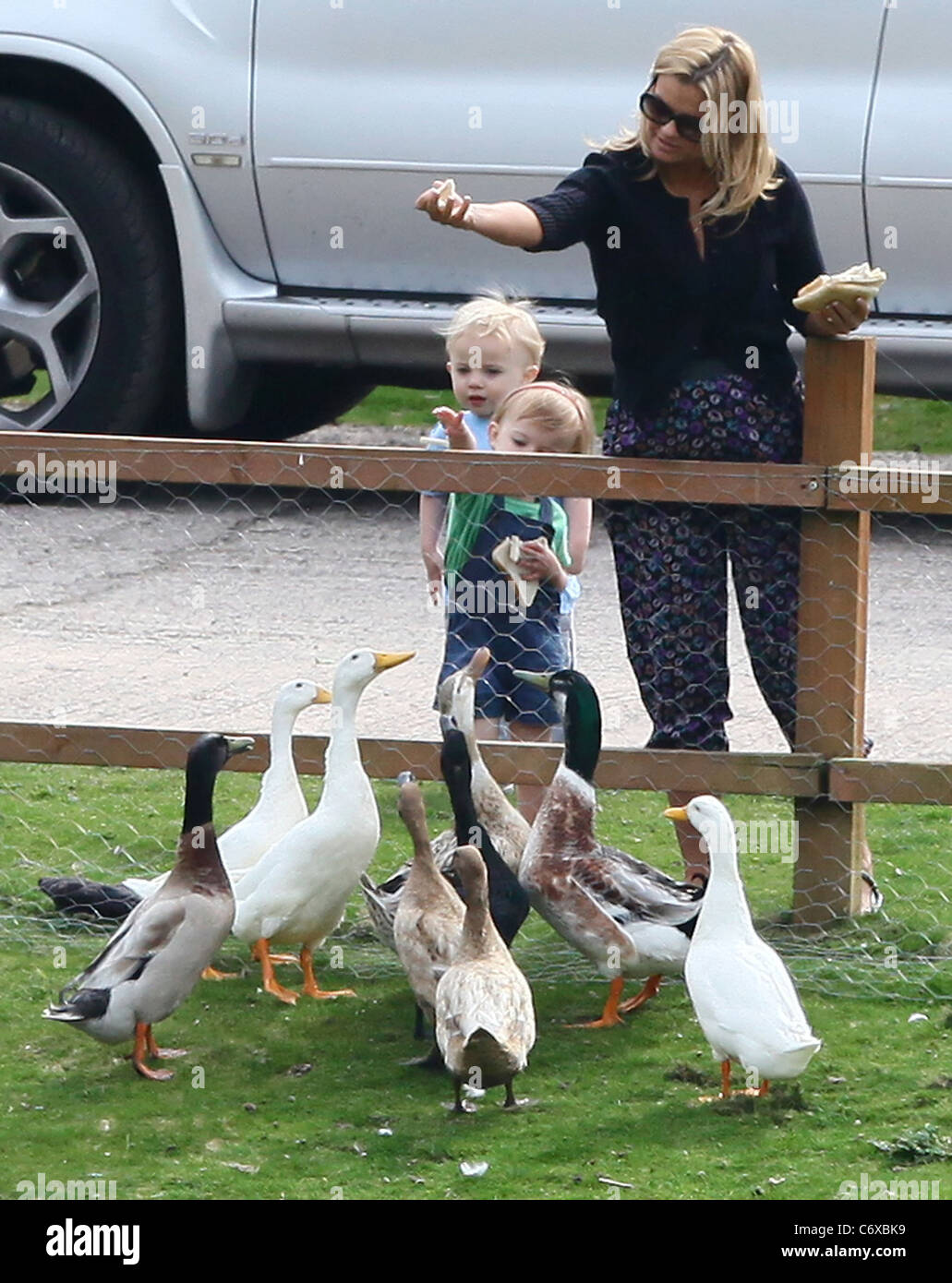 Kerry Katona feeding the ducks with her children Max and Heidi Sussex ...