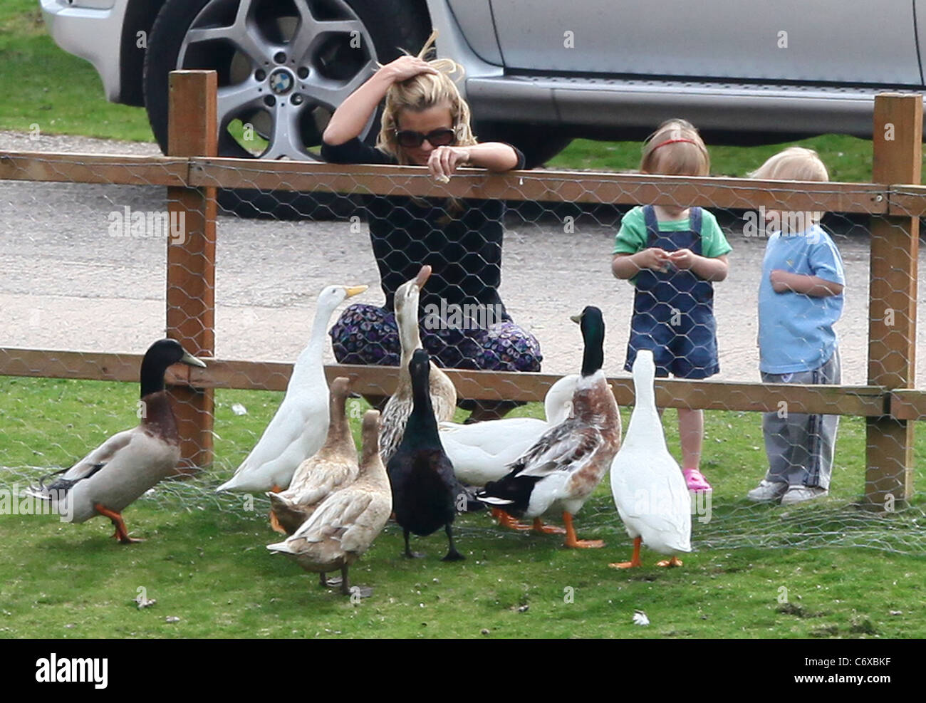 Kerry Katona feeding the ducks with her children Max and Heidi Sussex ...
