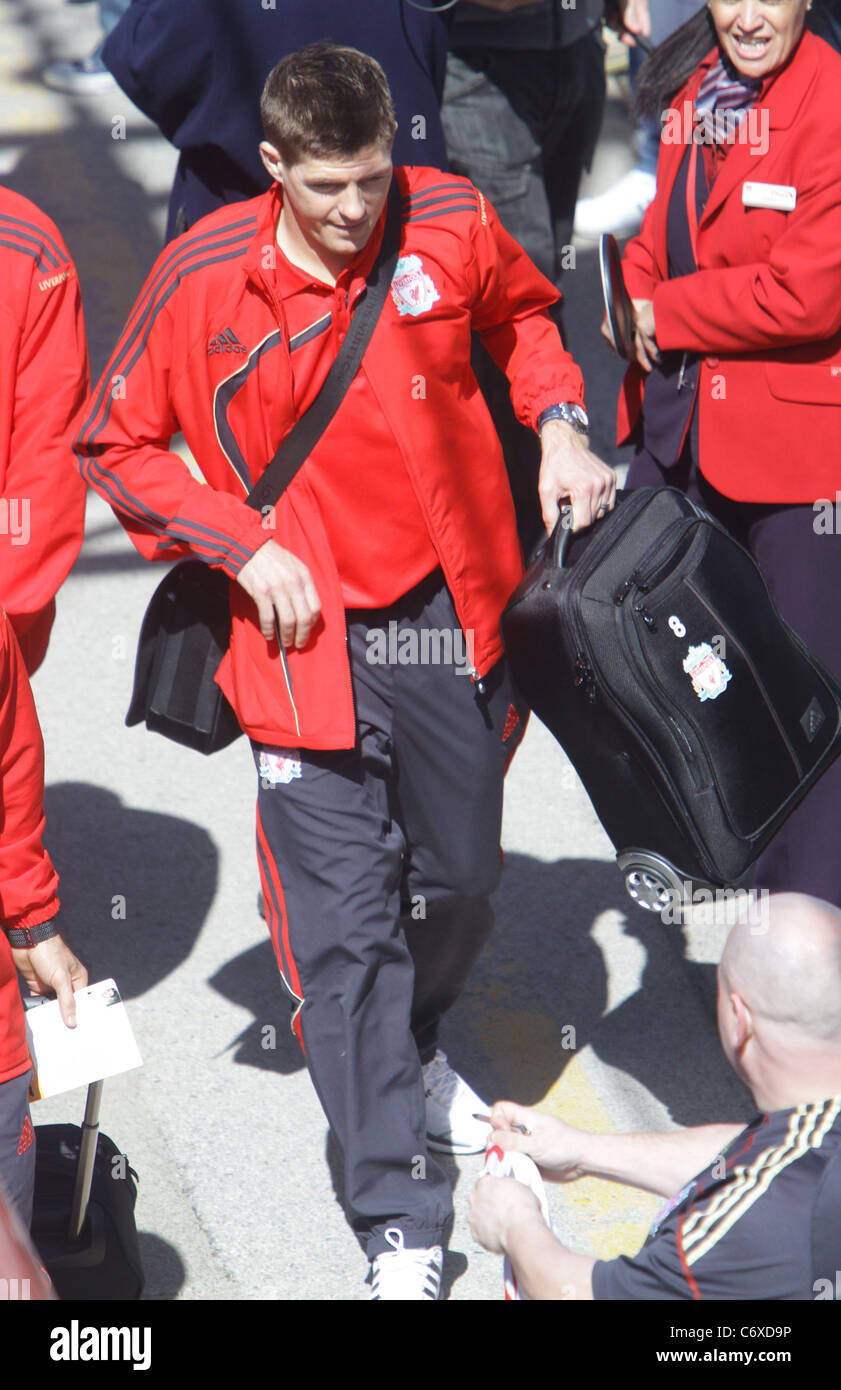Steven Gerrard catching a train at Runcorn station as flights out the ...