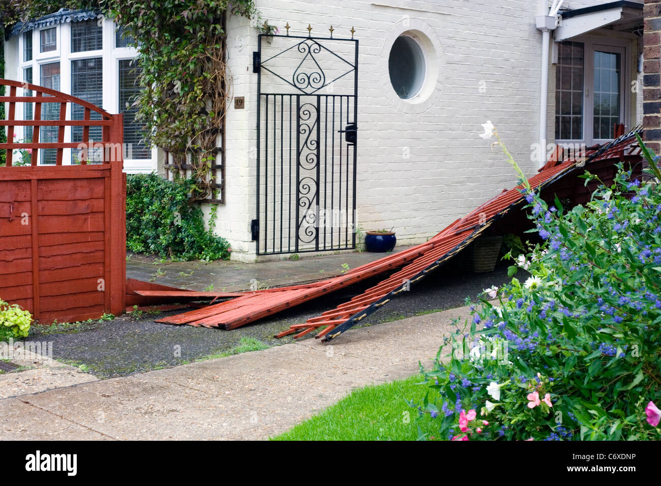 Blown down fence hi-res stock photography and images - Alamy