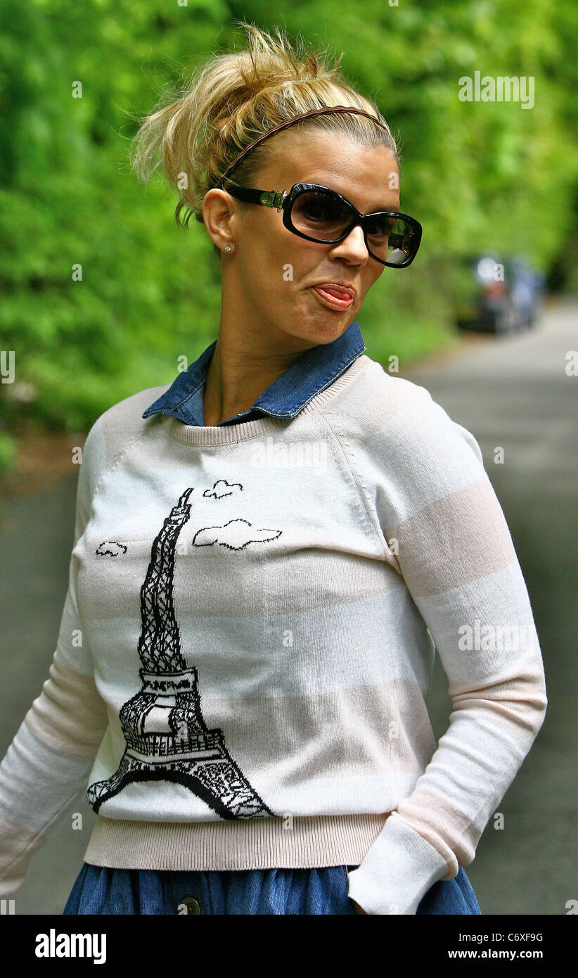 Kerry Katona outside her house wearing a jumper featuring the Eiffel ...