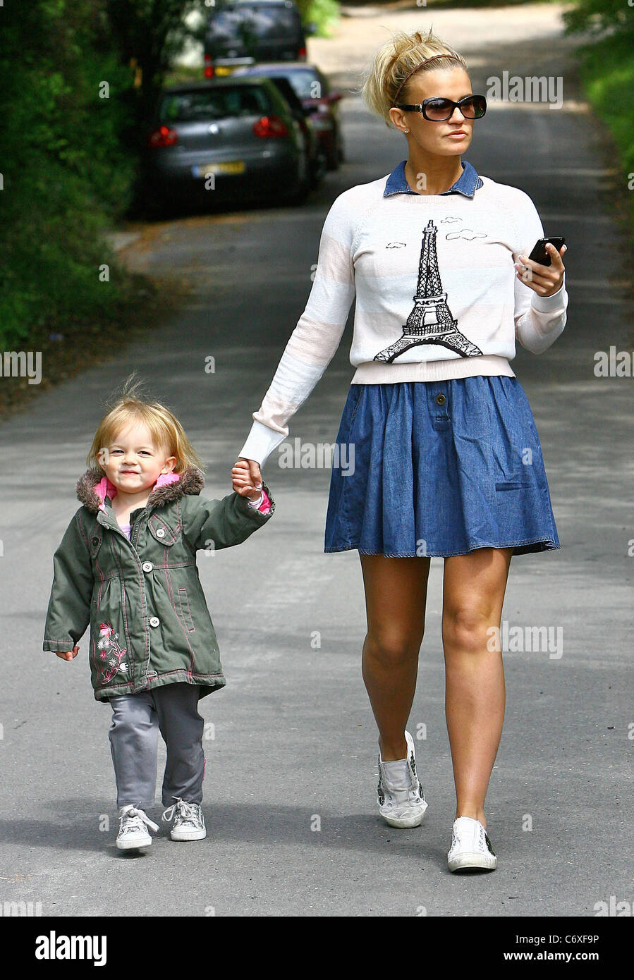 Kerry Katona Outside Her House With Her Daughter Heidi Wearing A Jumper