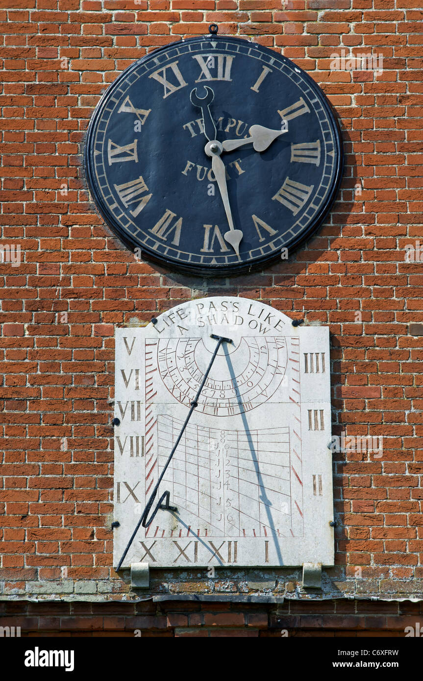 Clock and sundial Stock Photo - Alamy