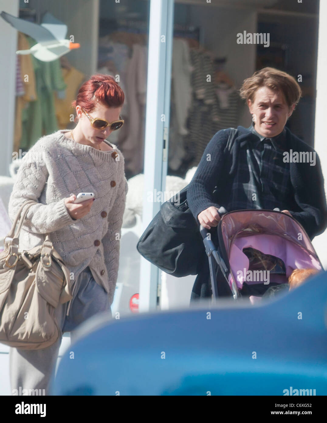 Mark Owen and his wife Emma Ferguson doing some shopping London ...