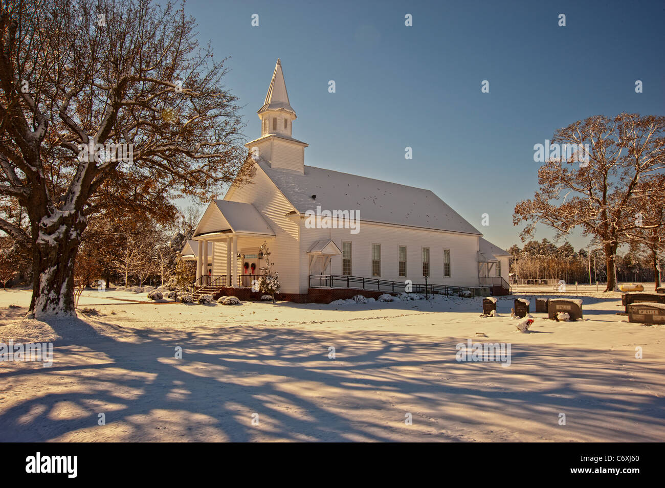 A country church covered in snow Stock Photo - Alamy