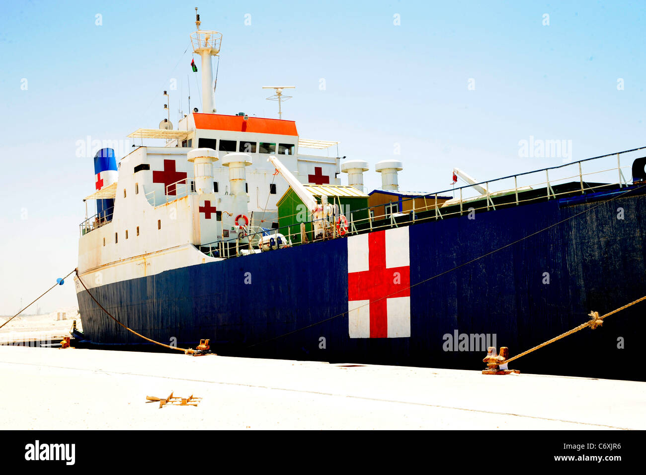 a red cross ship in the dock at Benghazi ready to sail Stock Photo - Alamy