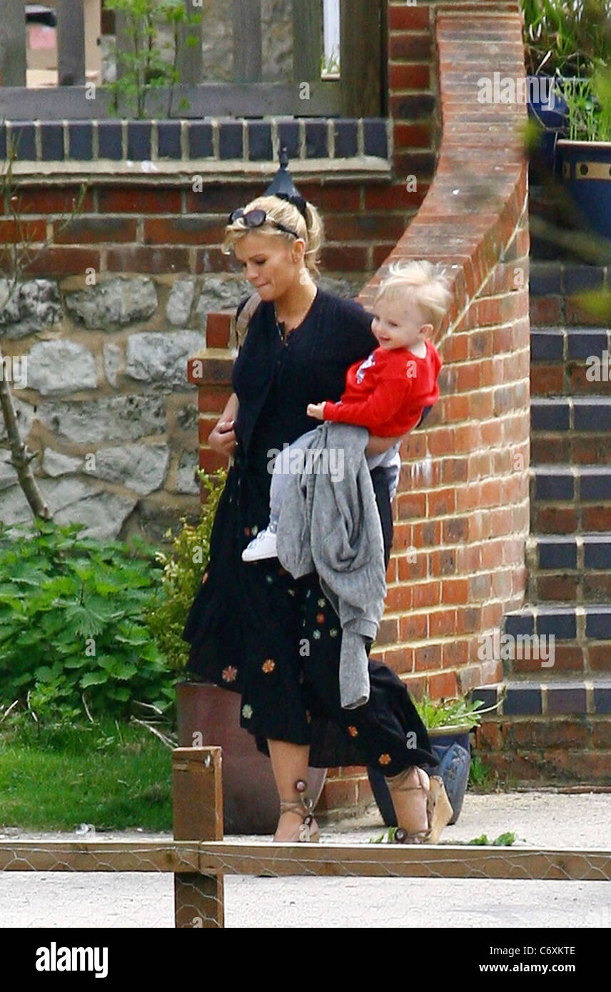 Kerry Katona and her son Max in the front garden of their new Surrey ...