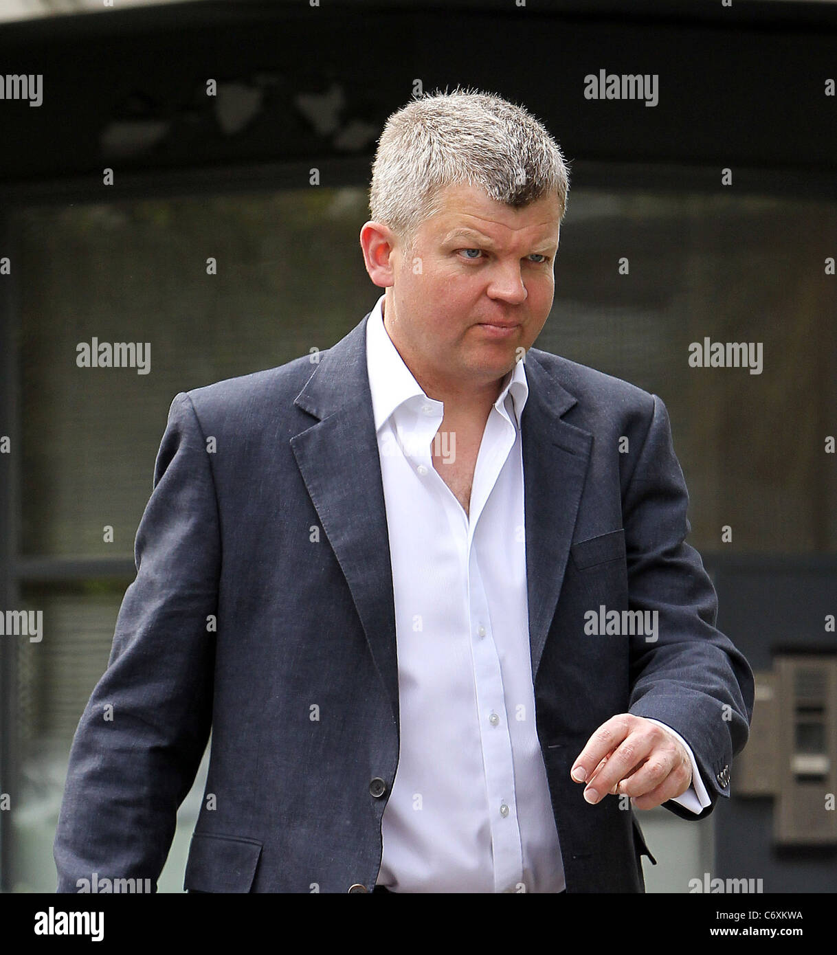 Adrian Chiles leaving his home on his way to a meeting at ITV. Chiles ...